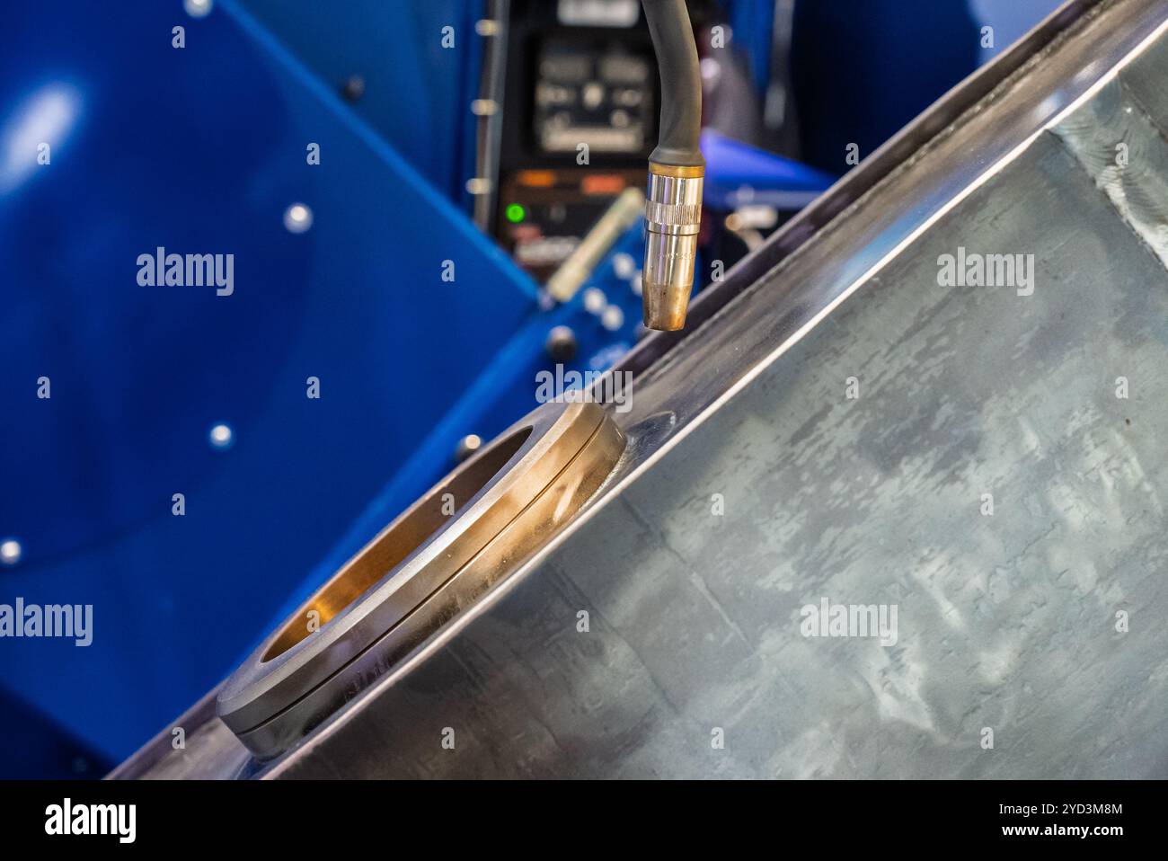 Robot welds steel. Welding head. Welding robot. CNC welding ...