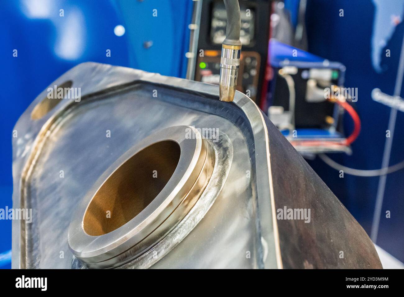 Robot welds steel. Welding head. Welding robot. CNC welding ...