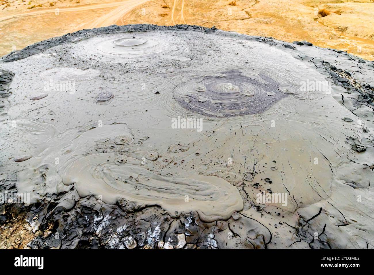 Bursting bubbling mud volcano in The Qobustan (Gobustan) National Park ...