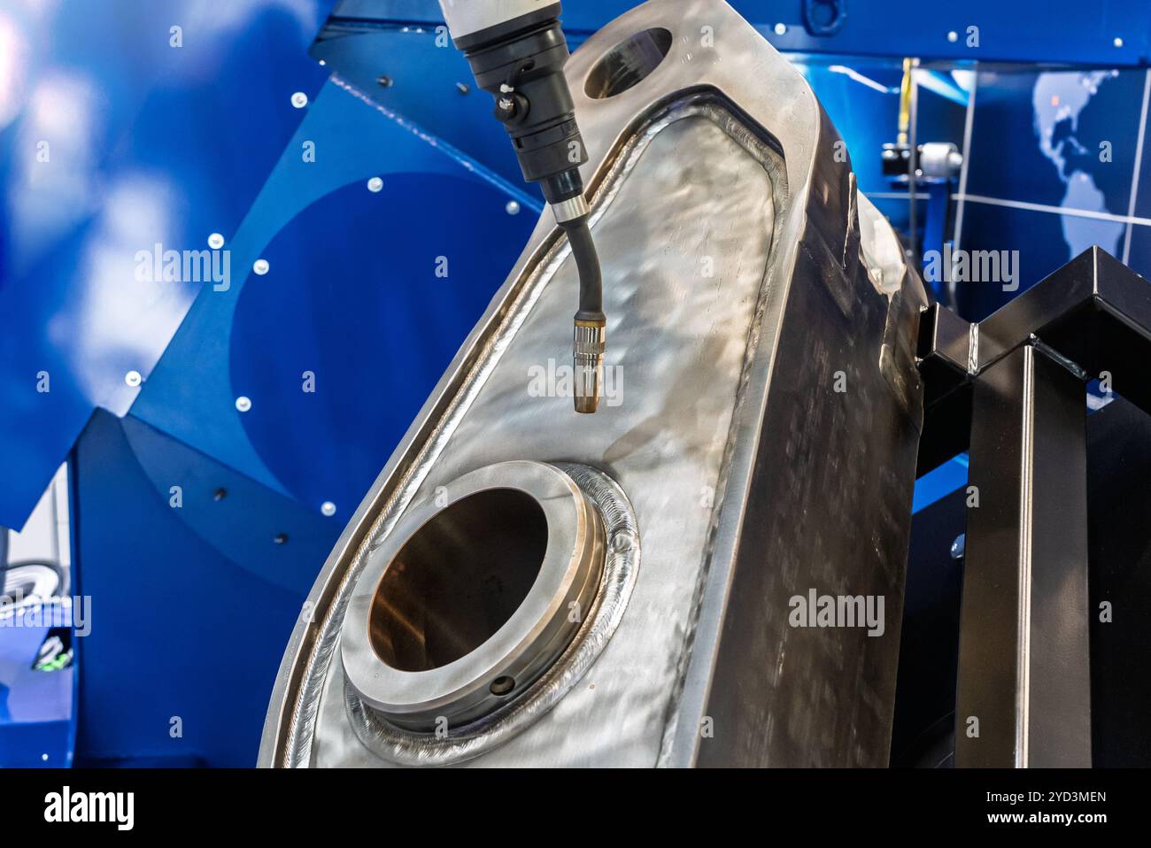 Robot welds steel. Welding head. Welding robot. CNC welding ...