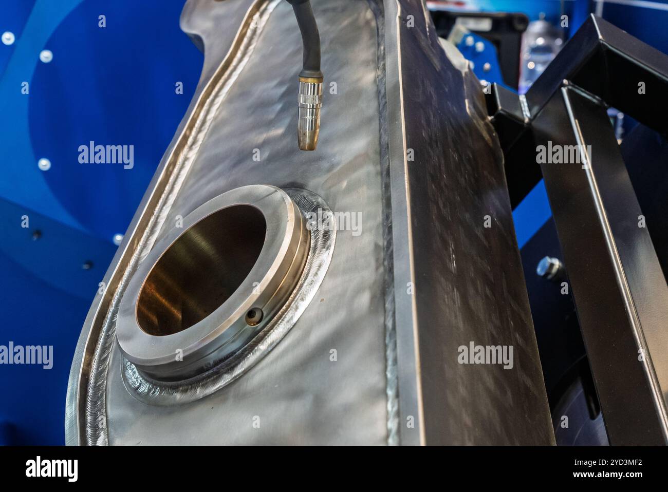 Robot welds steel. Welding head. Welding robot. CNC welding ...