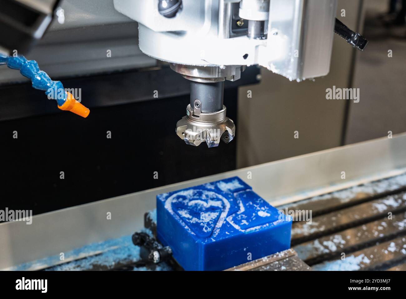 Metalworking CNC lathe milling machine with coolant. Milling a piece of ...