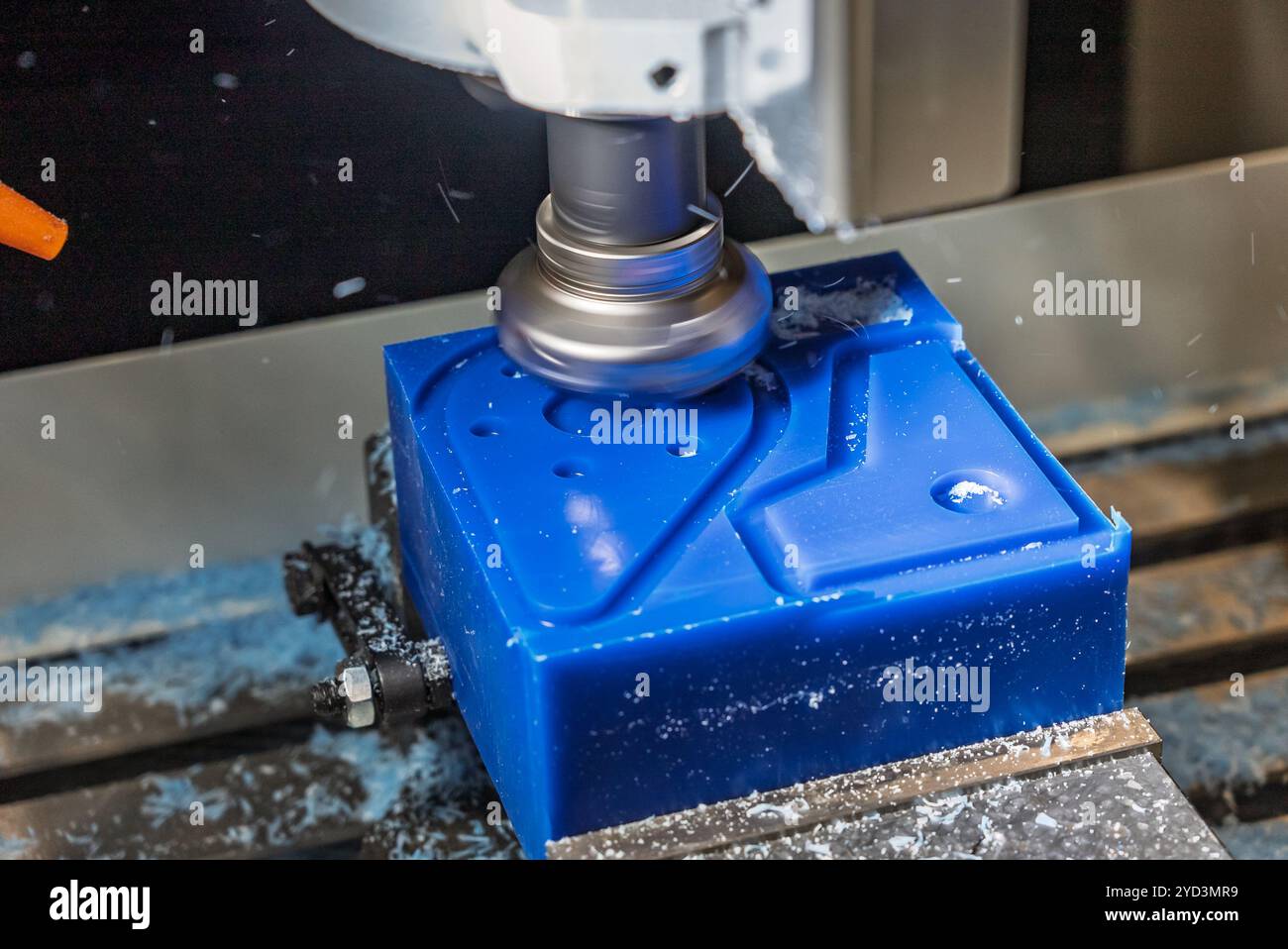 Metalworking CNC lathe milling machine with coolant. Milling a piece of ...