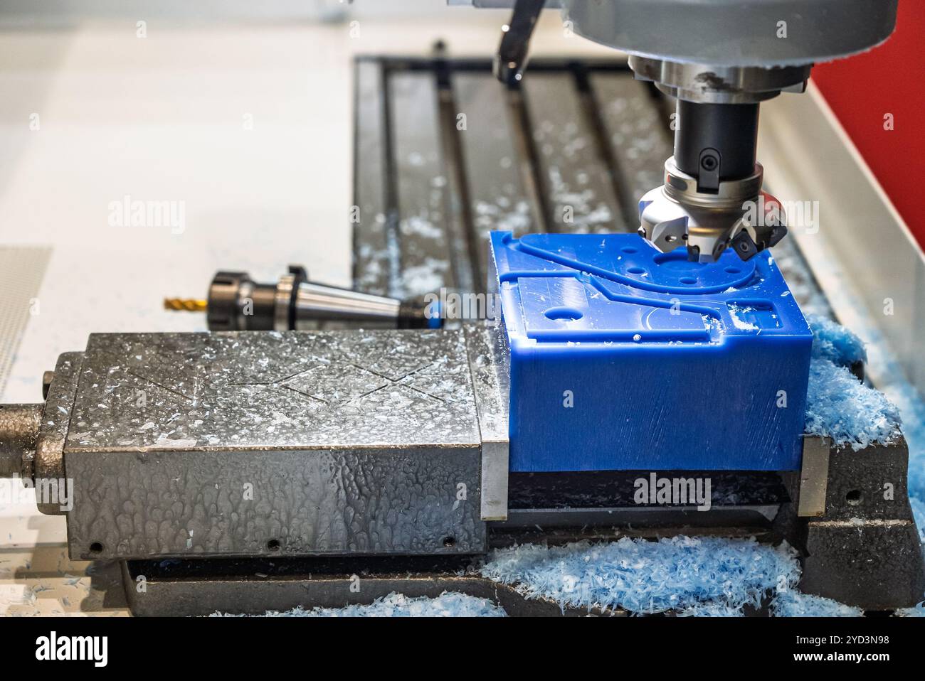 Metalworking CNC lathe milling machine with coolant. Milling a piece of ...