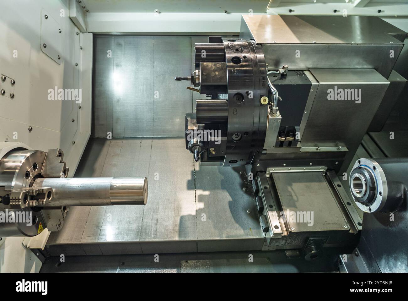 Cnc machine. The CNC lathe machine or Turning machine. Turning numerical control machine with ...