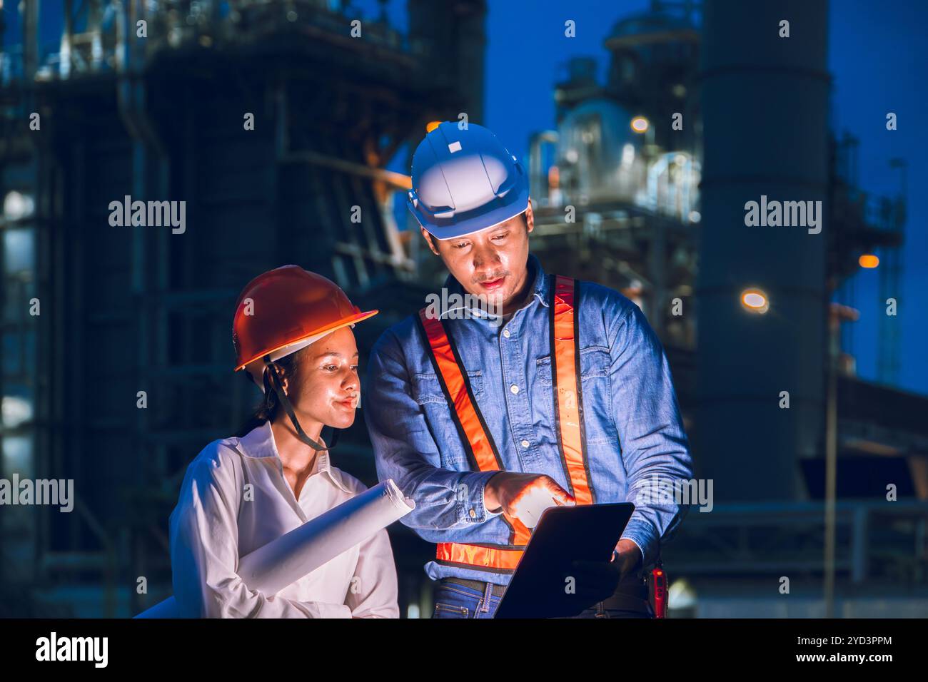 Petroleum refinery industry engineer night time working team. Power ...