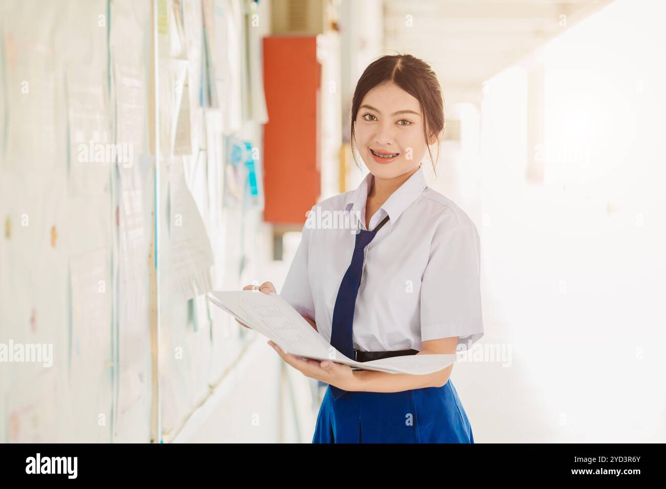 portrait Asian school uniform teen girl standing happy smile at ...