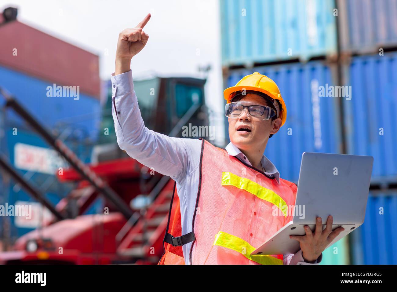 Happy Asian success professional male customs worker hand rising for in ...