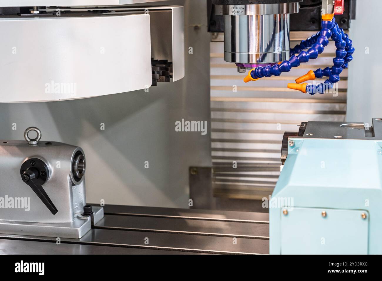 Metalworking CNC lathe milling machine with coolant. Milling a piece of ...