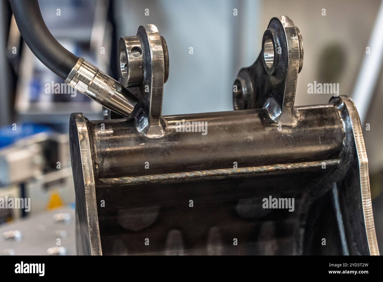 Robot welds steel. Welding head. Welding robot. CNC welding ...