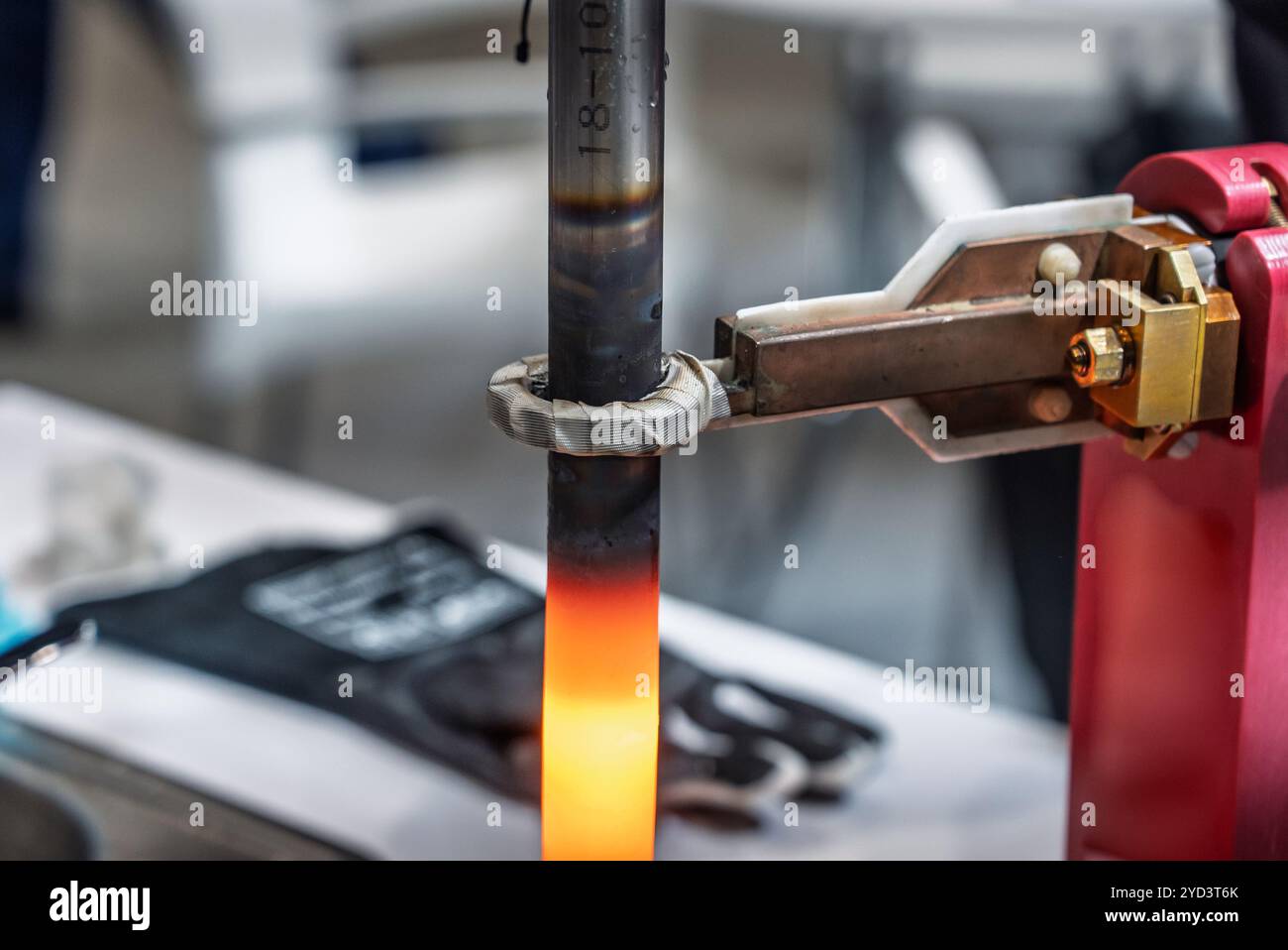 Induction hardening type of surface hardening . Metal part is induction ...