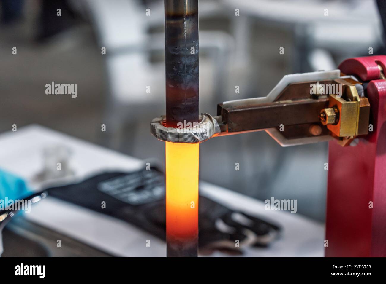 Induction hardening type of surface hardening . Metal part is induction ...