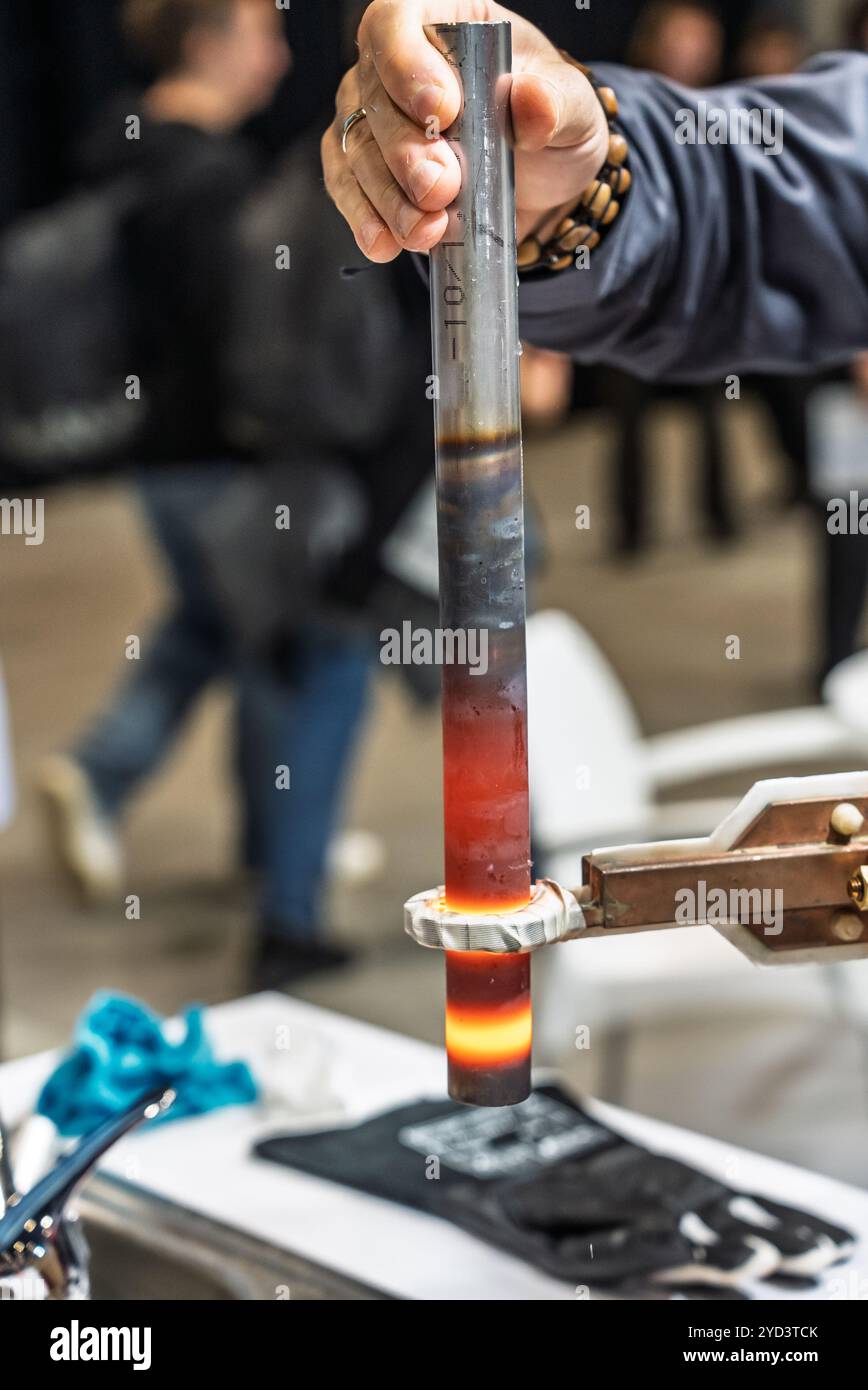 Induction hardening type of surface hardening . Metal part is induction ...