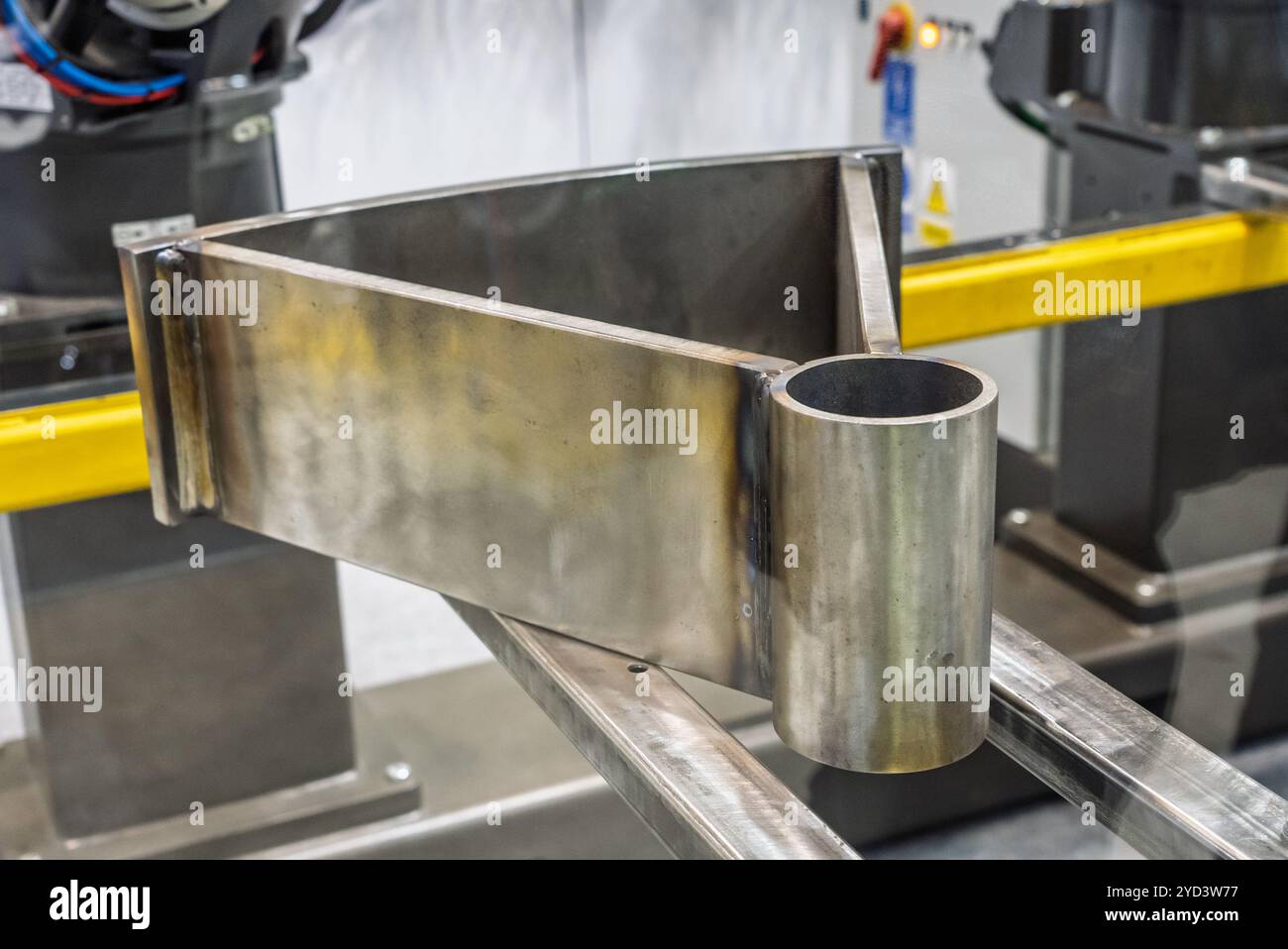 Robot welds steel. Welding head. Welding robot. CNC welding ...