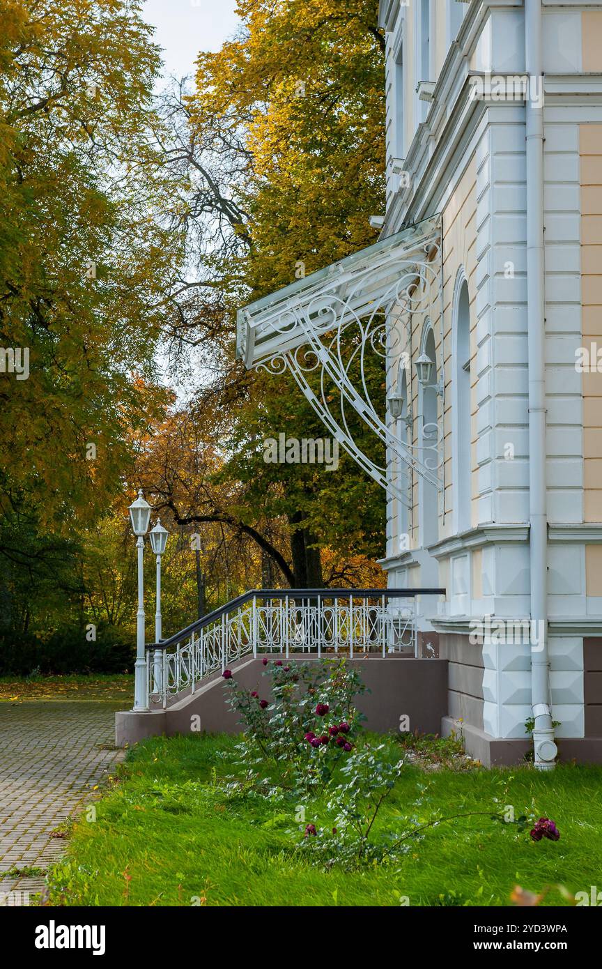 Side view of concrete steps and railing leading to entrance to the ...
