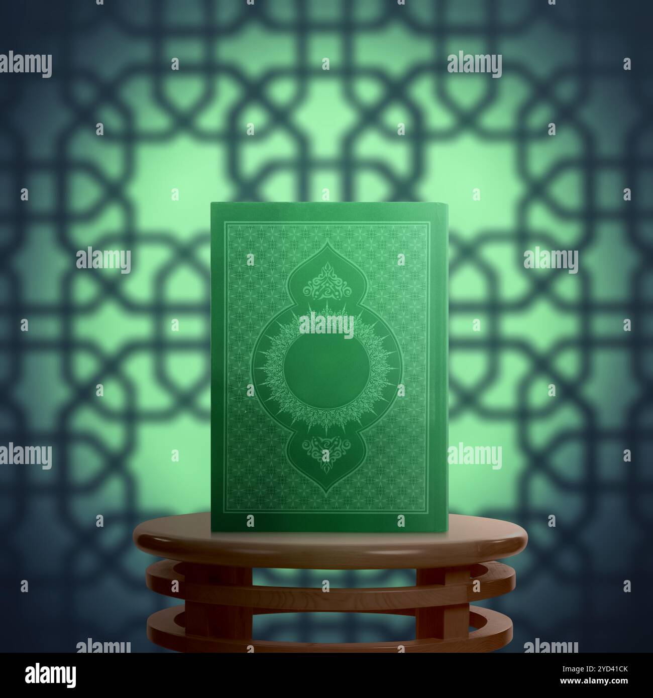 The holy book of Al Quran sitting on the table with abstract green ...