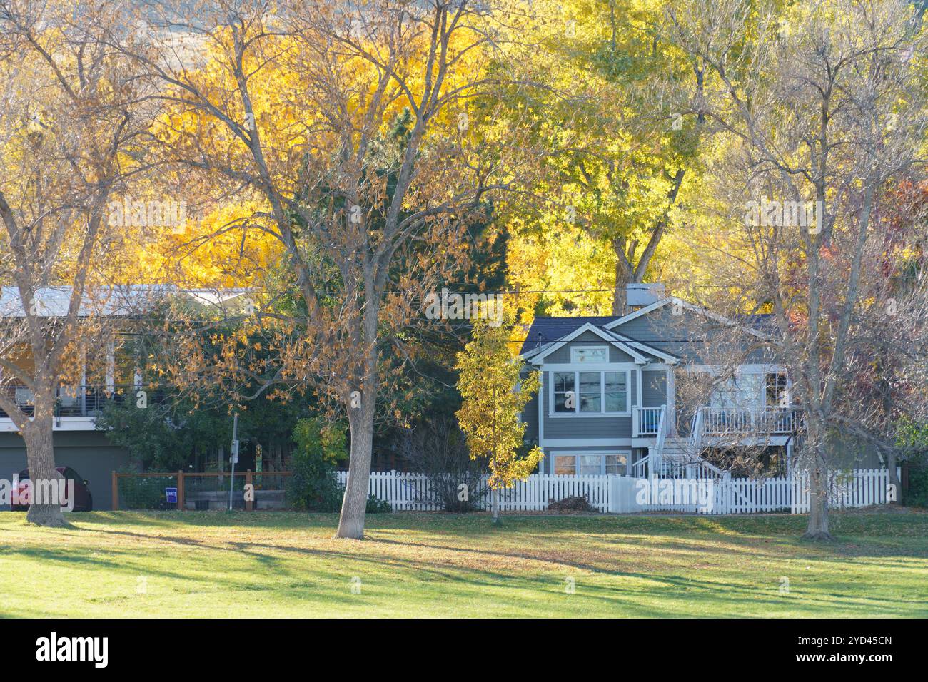Fall House In The Color Trees Stock Photo - Alamy
