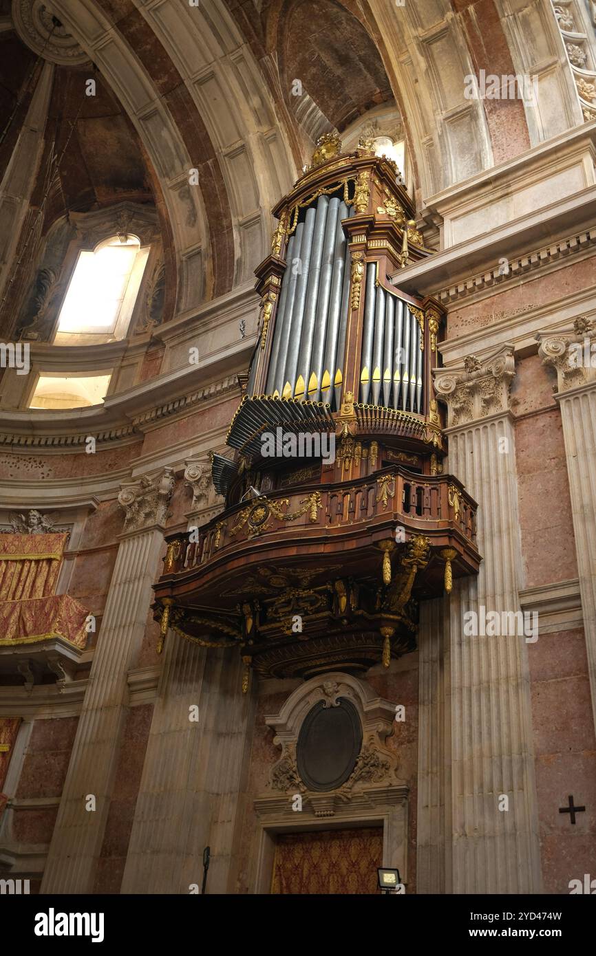 Baroque pipe organ in the church of the royal palace in Mafra Stock ...