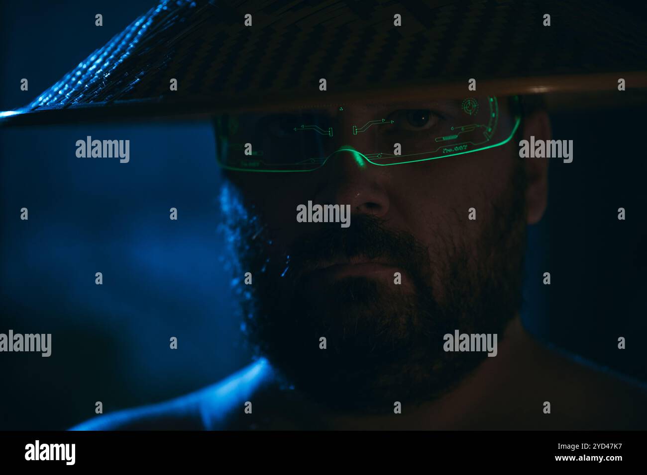 Shadowy figure with glowing glasses Stock Photo - Alamy