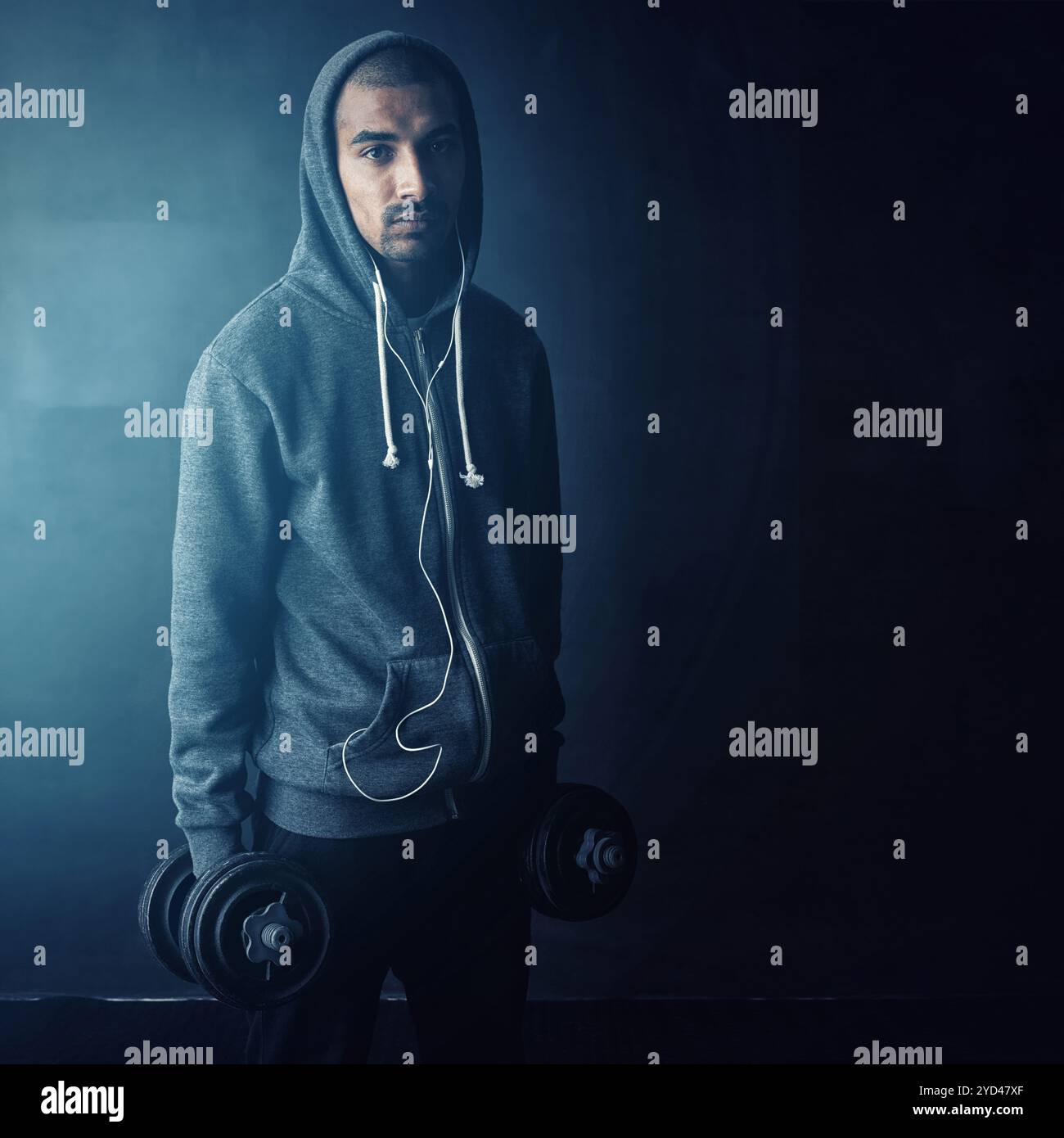 Man, dumbbells and earphones in studio portrait, muscle and mock up ...