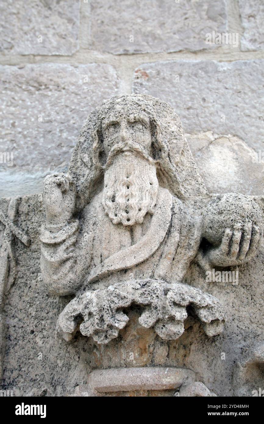 Statue of God the Creator, on the portal of the church of St. Mary of ...