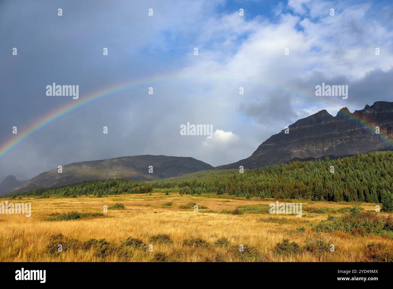 A double rainbow over Glacier National Park at dawn Stock Photo - Alamy
