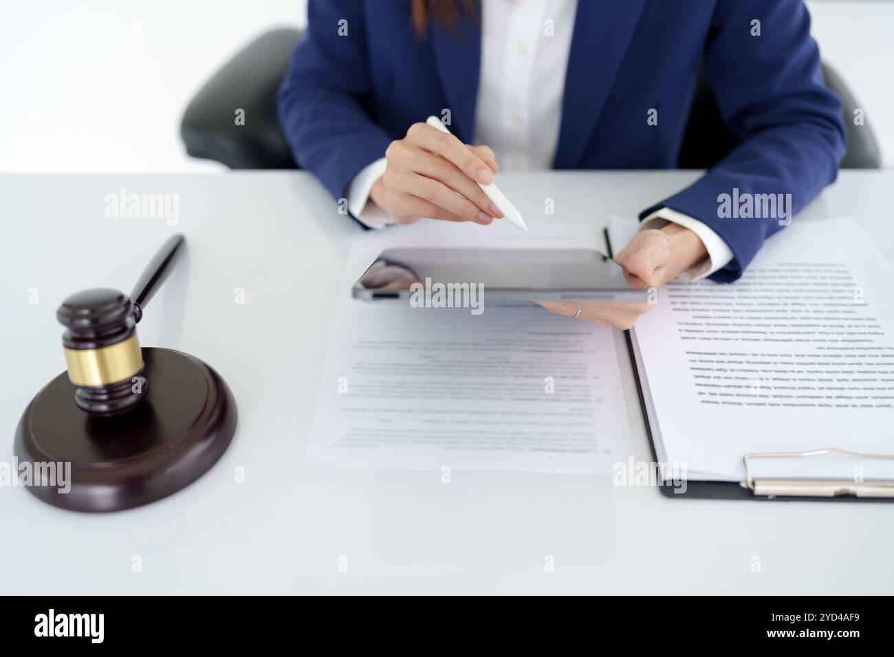 Lawyer working legal data contract at workplace Stock Photo - Alamy