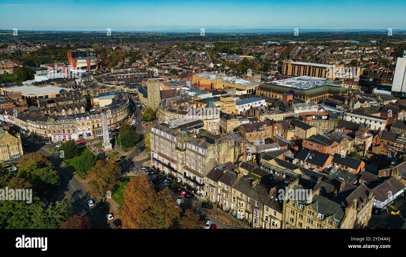 Aerial View of a Bustling Town with Historic and Modern Architecture ...