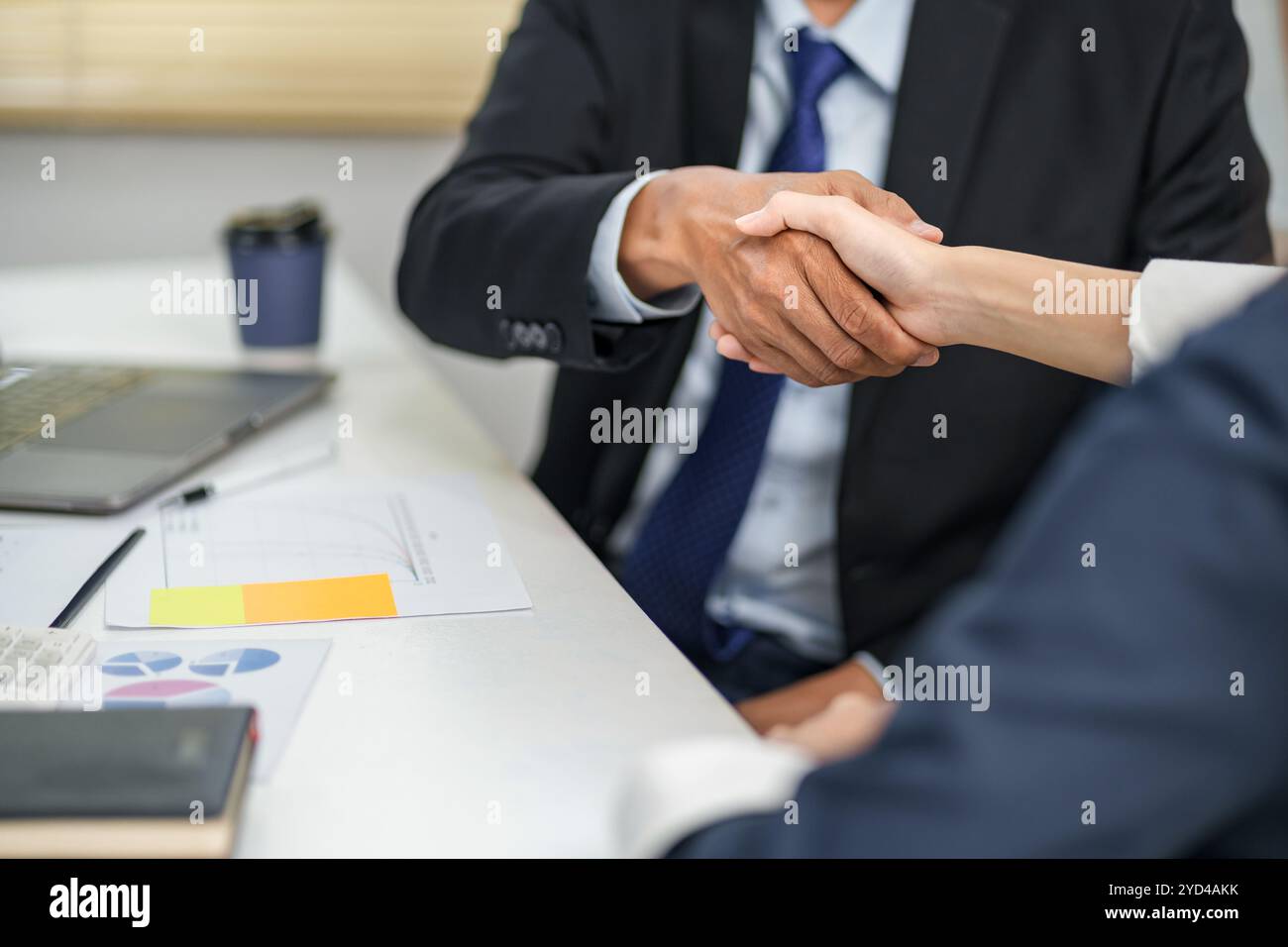 Executives business partnership handshake in meeting room Stock Photo ...