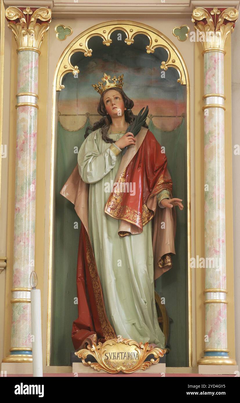 Statue of Saint Catherine of Alexandria on the altar of Our Lady in the ...