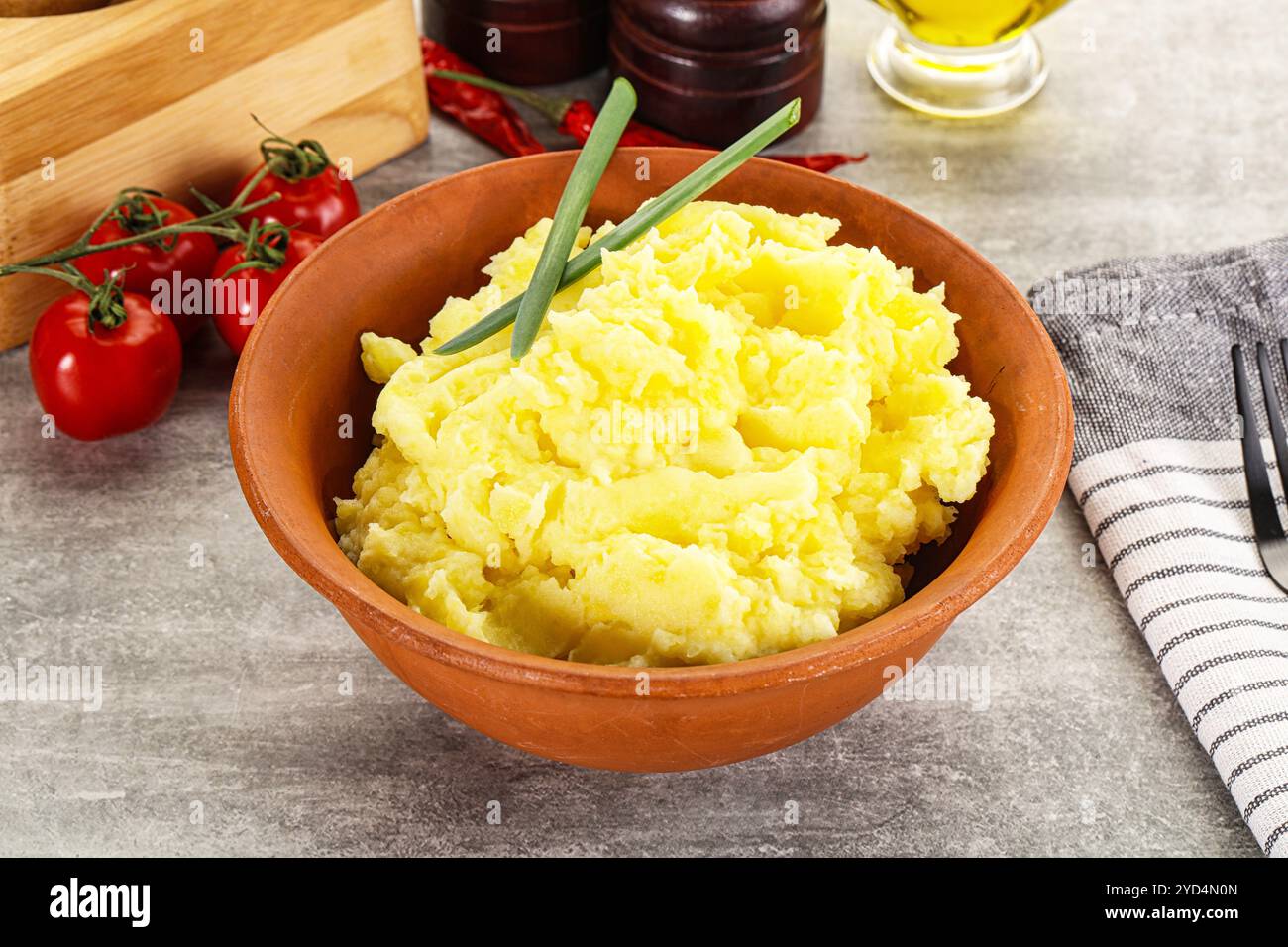 Mashed potato Puree with butter served green onion Stock Photo - Alamy