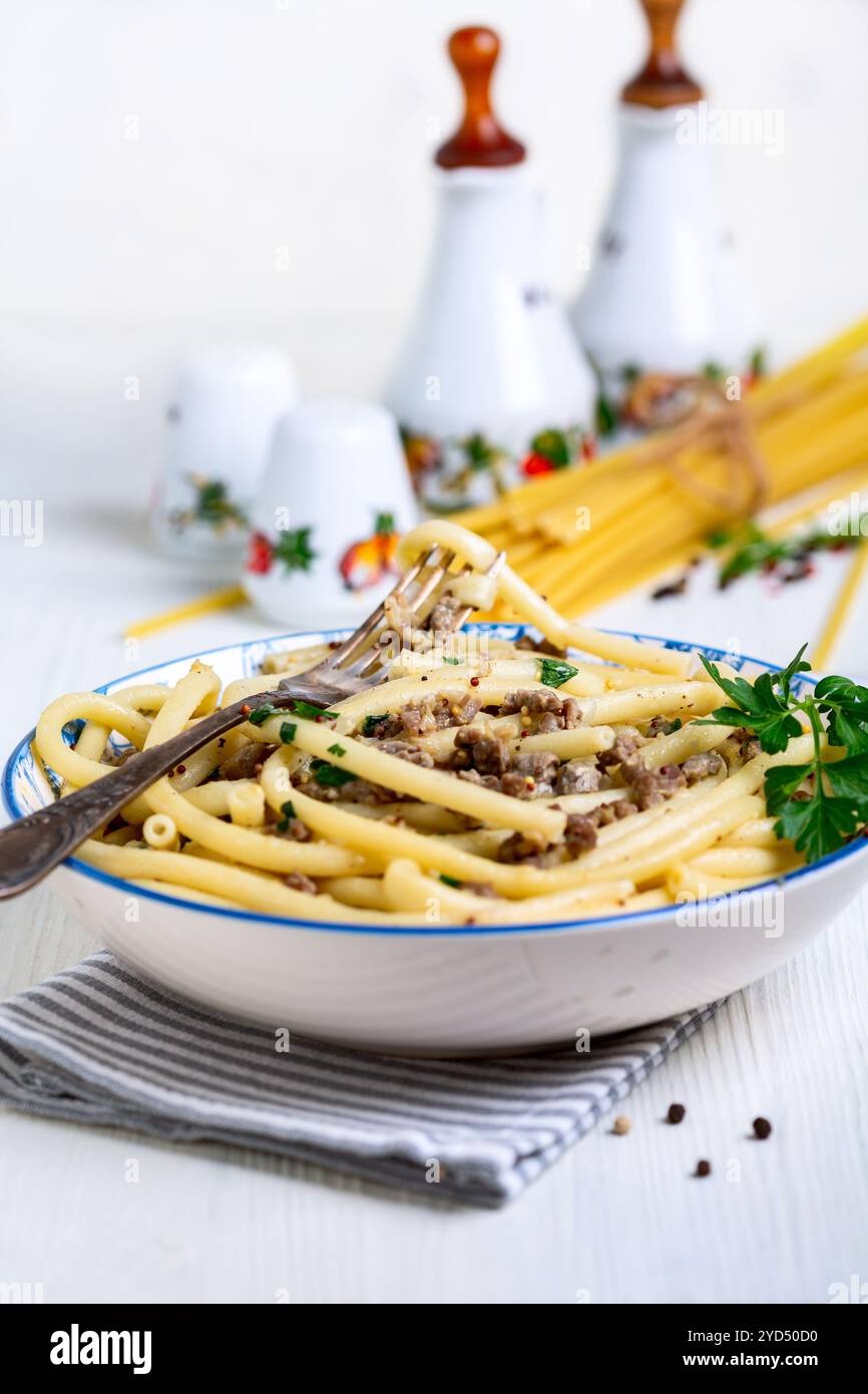 Macaroni with minced meat and herbs Stock Photo - Alamy