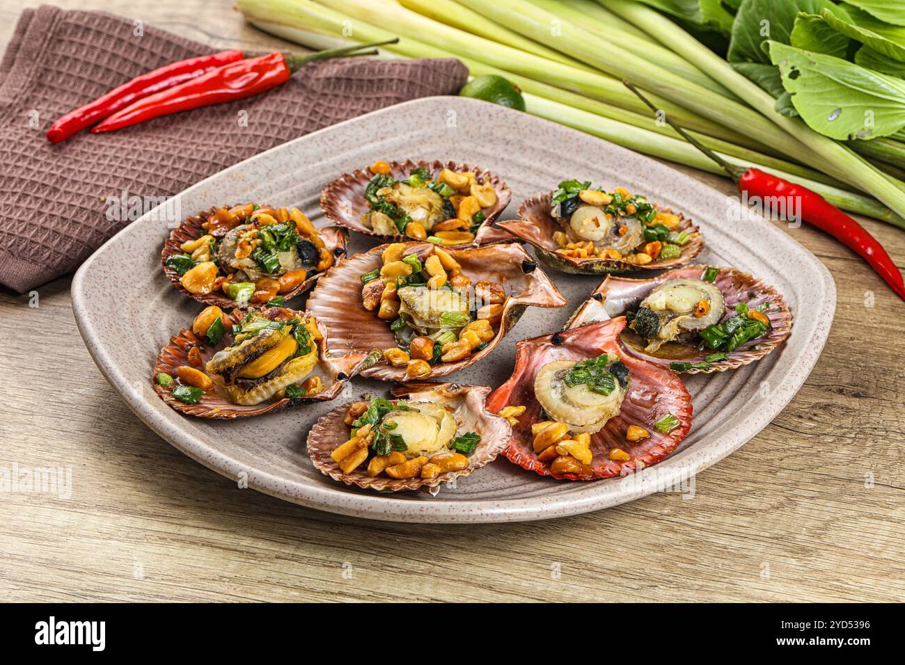 Baked scallops with scalion oil and green onion Stock Photo - Alamy