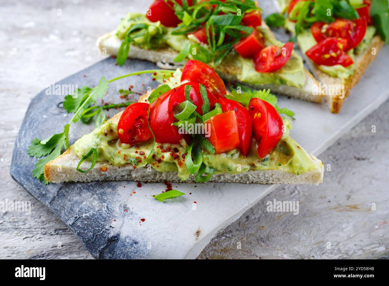 Traditional toast triangle sandwich with tomato Stock Photo - Alamy