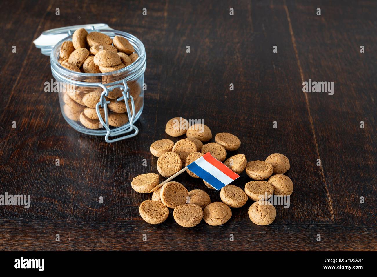 Kruidnoten with dutch flag on wooden table, typical dutch cookie made ...