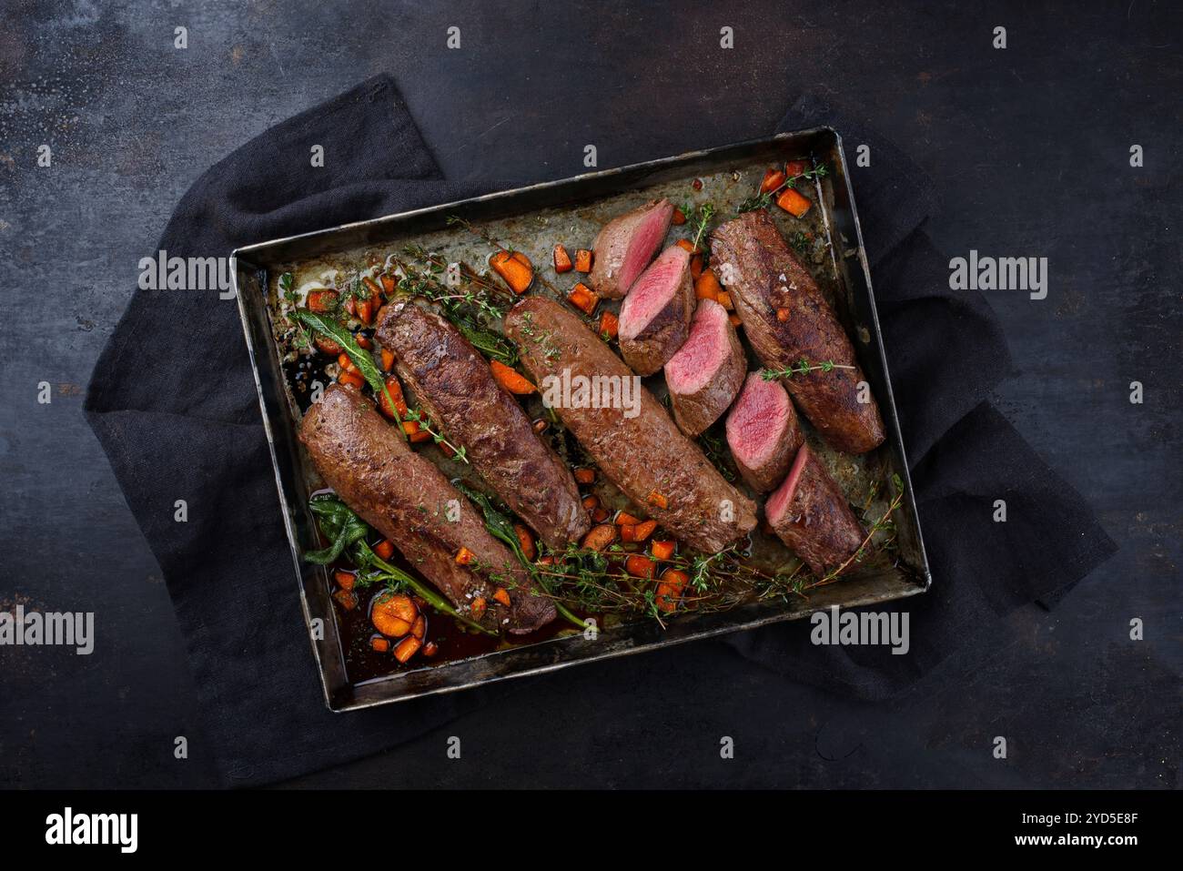 Traditional fried venison back filet with chard Stock Photo - Alamy