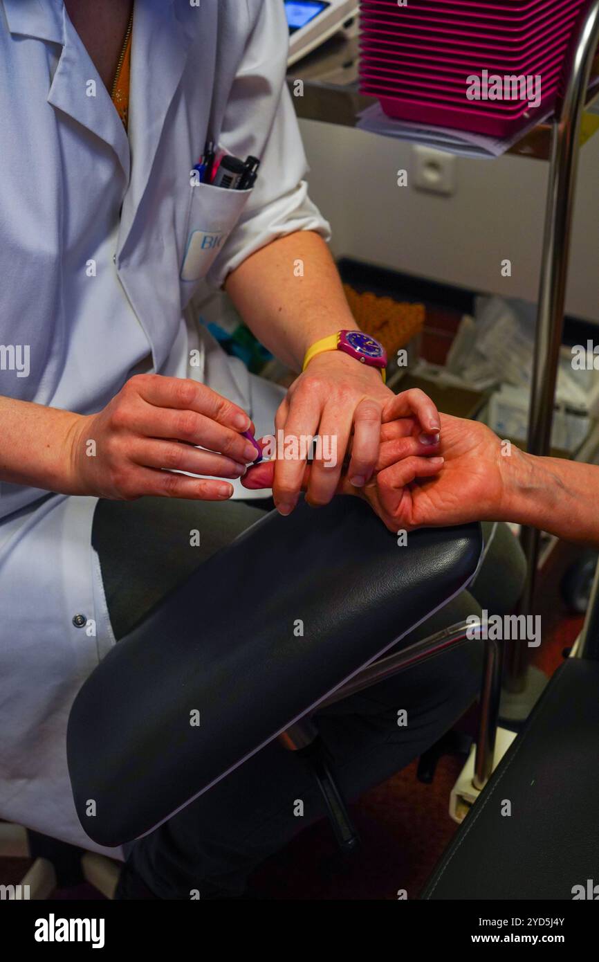 Blood analyzes in a laboratory with the LabPad system, a portable ...