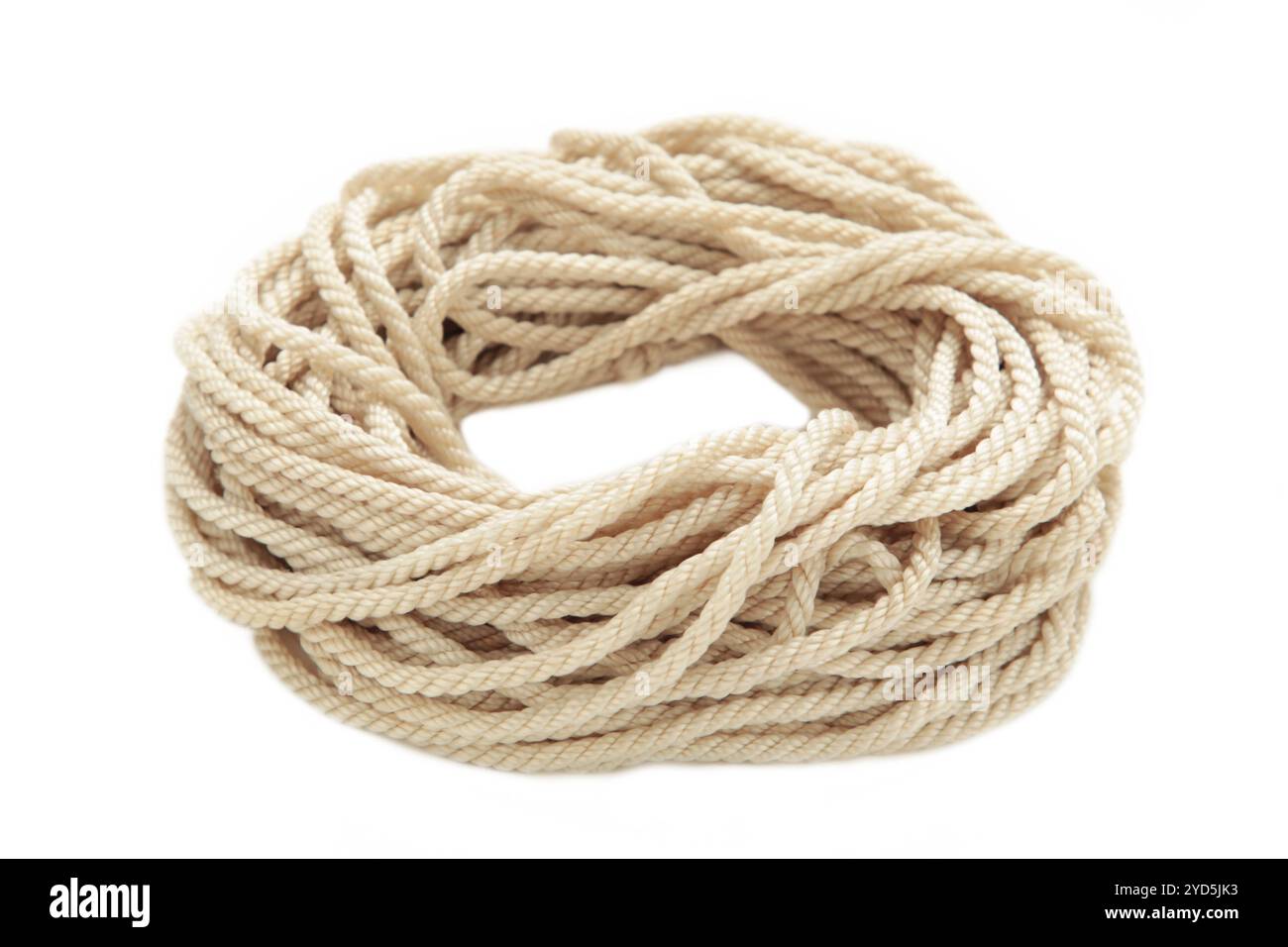 Coil of rope isolated on a white background close up. Top view Stock ...