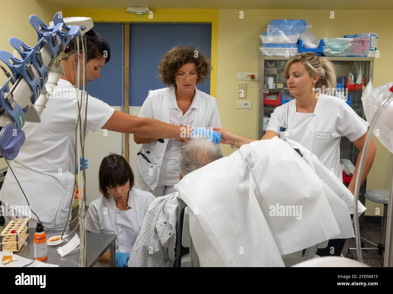 Nurse patient performing procedure on hi-res stock photography and ...