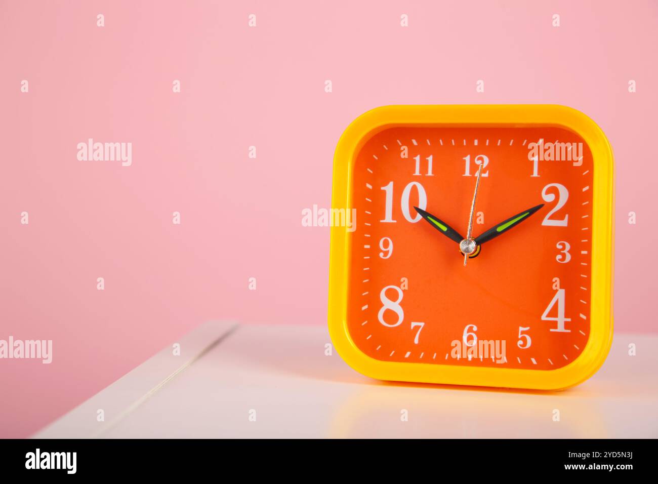 Classic pink table clock hi-res stock photography and images - Alamy
