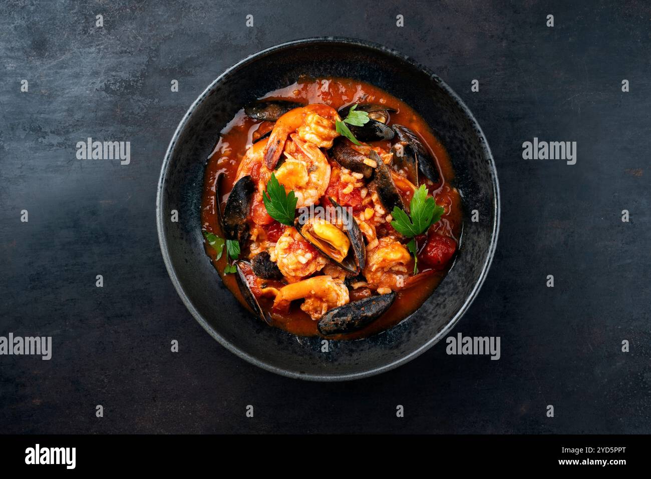 Traditional Creole cajun court bouillon with rice, mussels and prawn ...