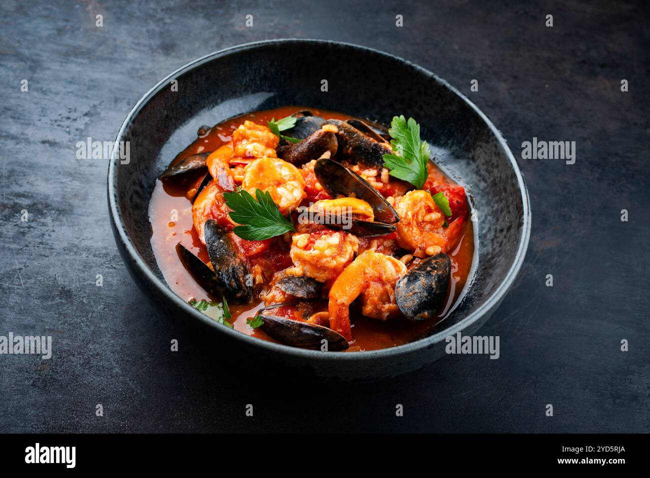 Traditional Creole cajun court bouillon with rice, mussels and prawn ...