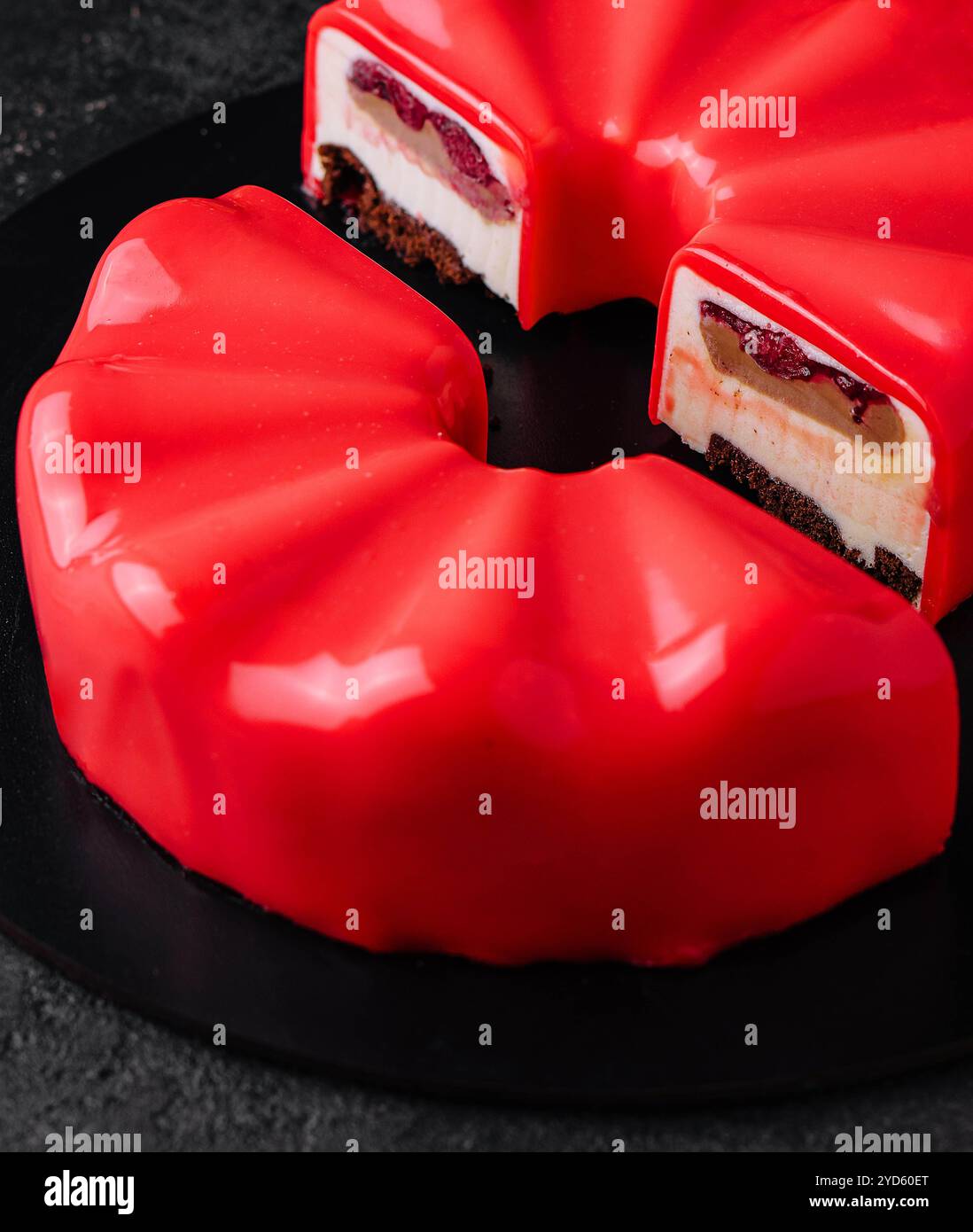 Contemporary Chocolate Cherry Mousse Cake covered with cherry icing ...