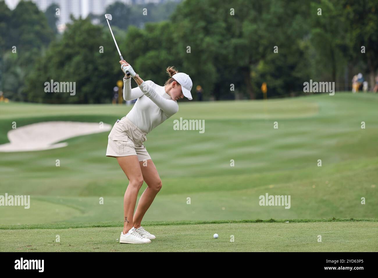 KUALA LUMPUR, - OCTOBER 25: Nataliya Guseva play a shot during the ...