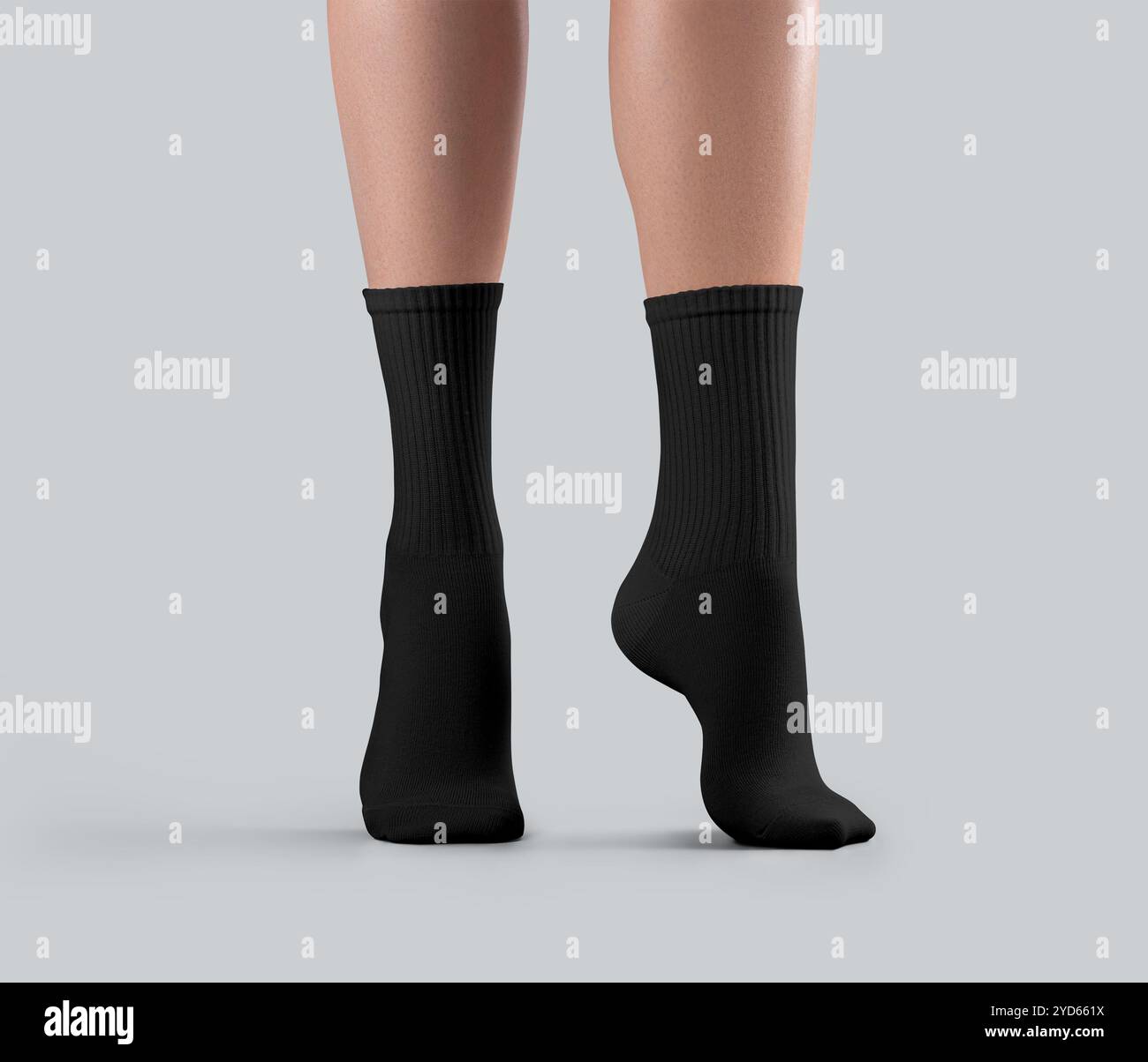 Template of black long gaiters on women's legs on tiptoes, one foot ...