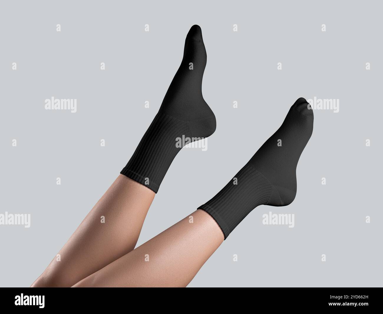Mockup of black high elastic socks on female beautiful legs upside down, diagonal side view ...