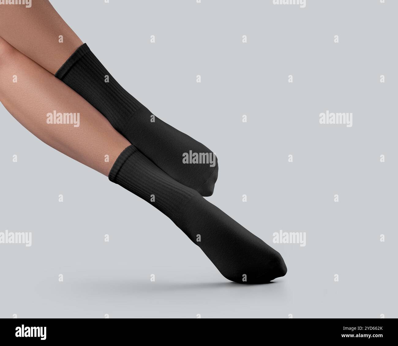 Mockup of black high socks with elastic band on female stretched feet ...