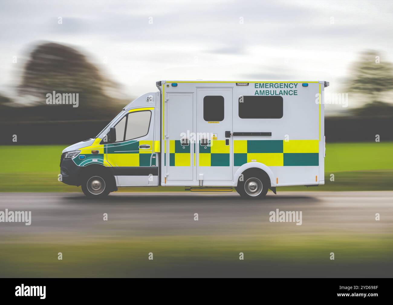 British Ambulance Rushing To An Emergency Stock Photo - Alamy