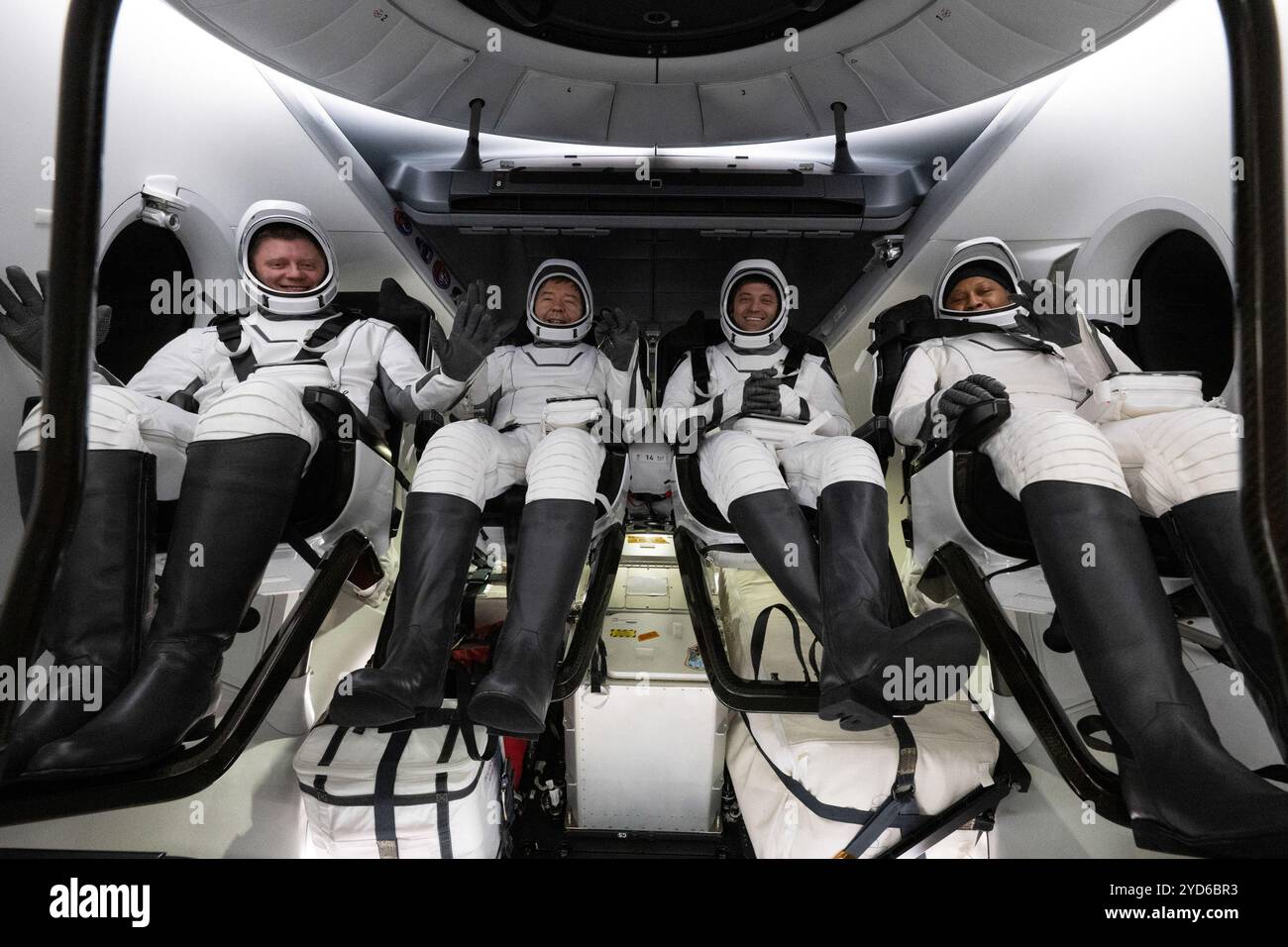 Roscosmos cosmonaut Alexander Grebenkin, left, NASA astronauts Michael ...