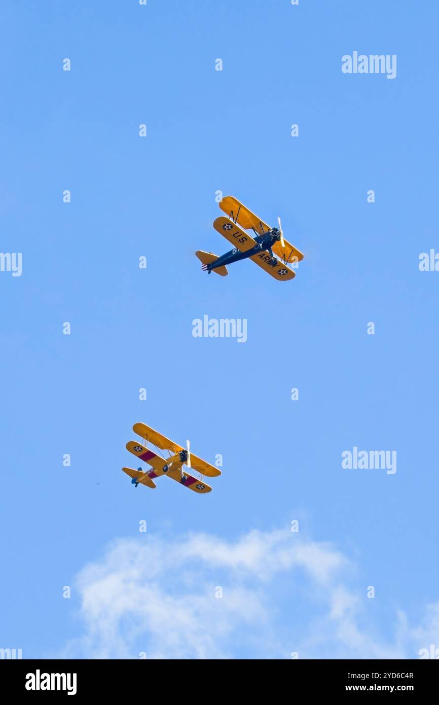 Two biplanes flying in formation Stock Photo - Alamy